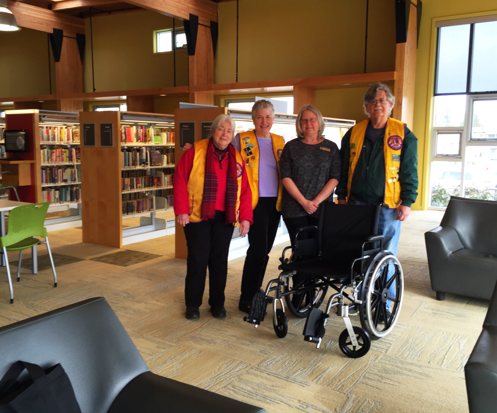 Lions Club presents Library with new wheelchair 2018-03-07 l-r Lions ...